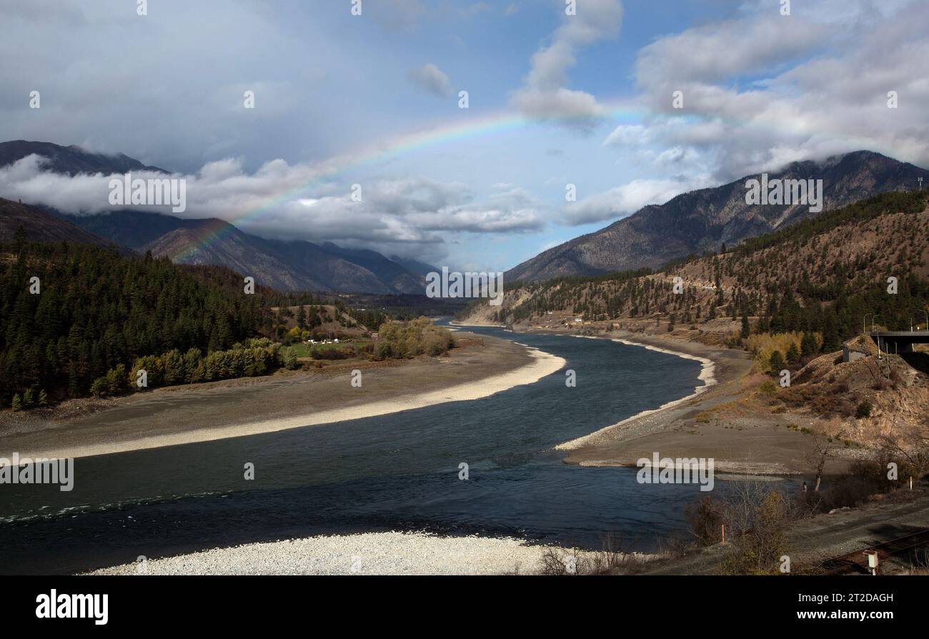 A rainbow can been seen over where the Fraser and Thompson Rivers meet ...