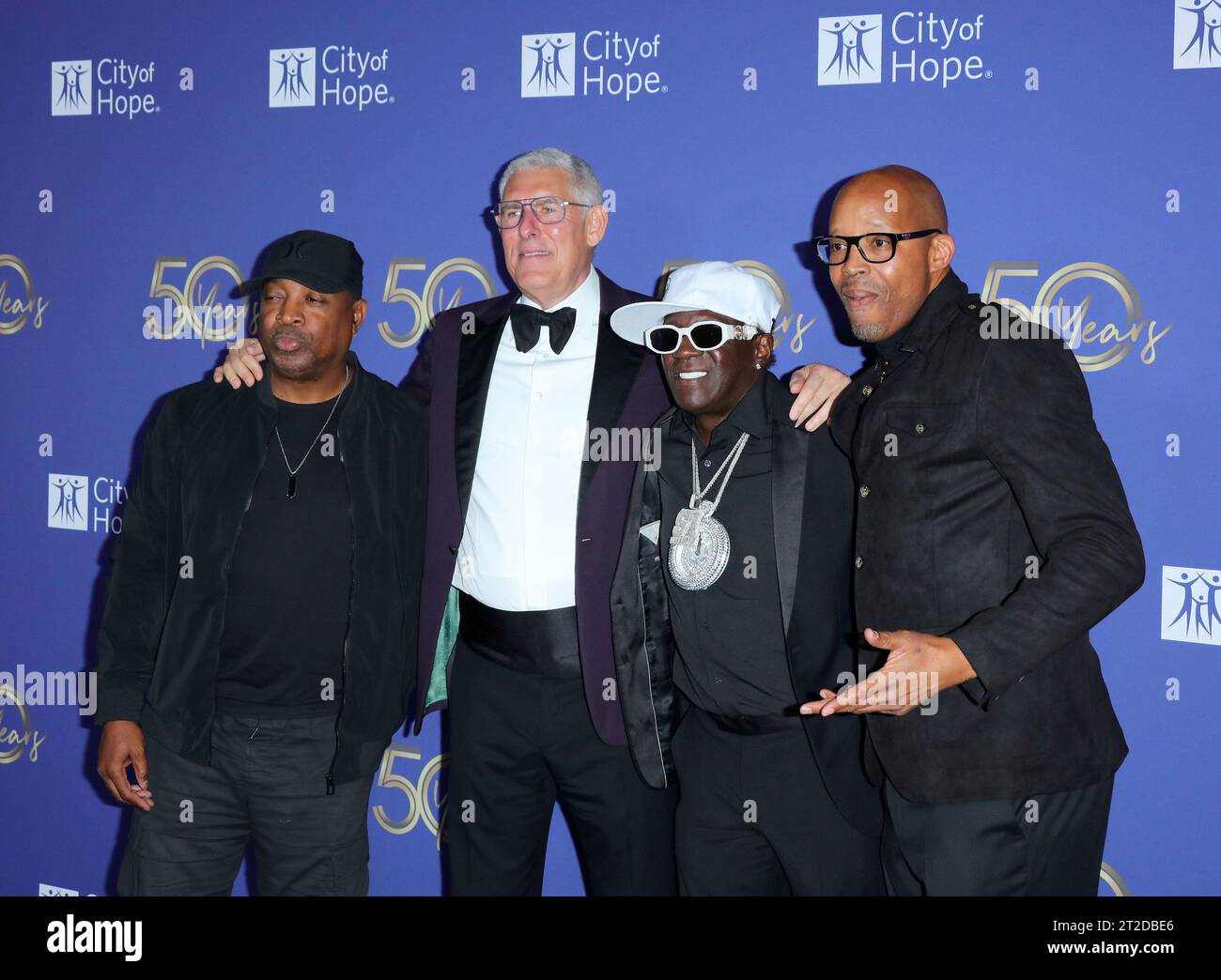 Chuck D, Lyor Cohen, Flavor Fav, Warren G arrives at The City of Hope ...