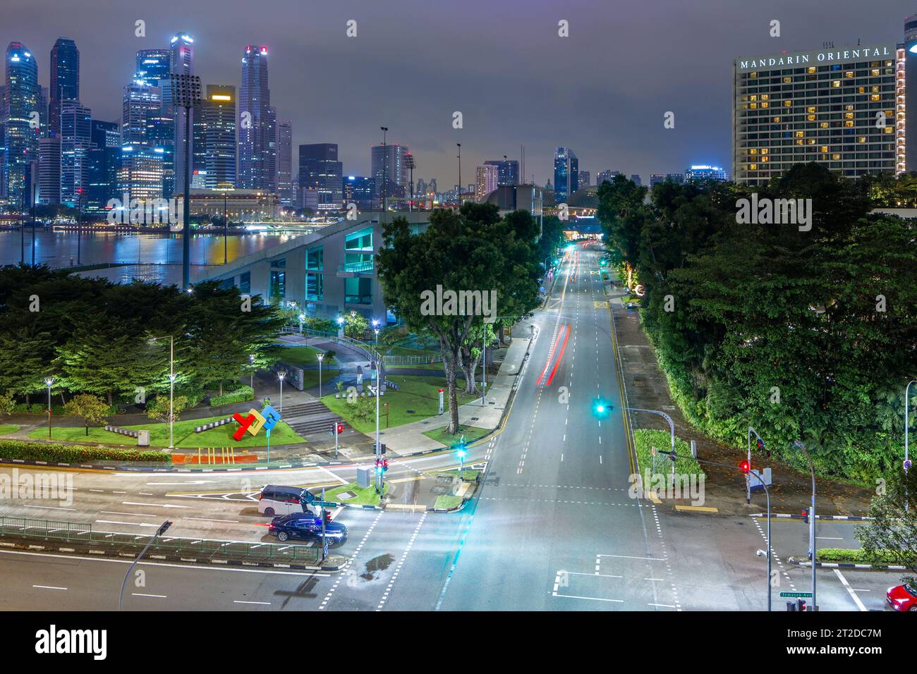 A night view of Singapore and Raffles Avenue at its intersection with ...