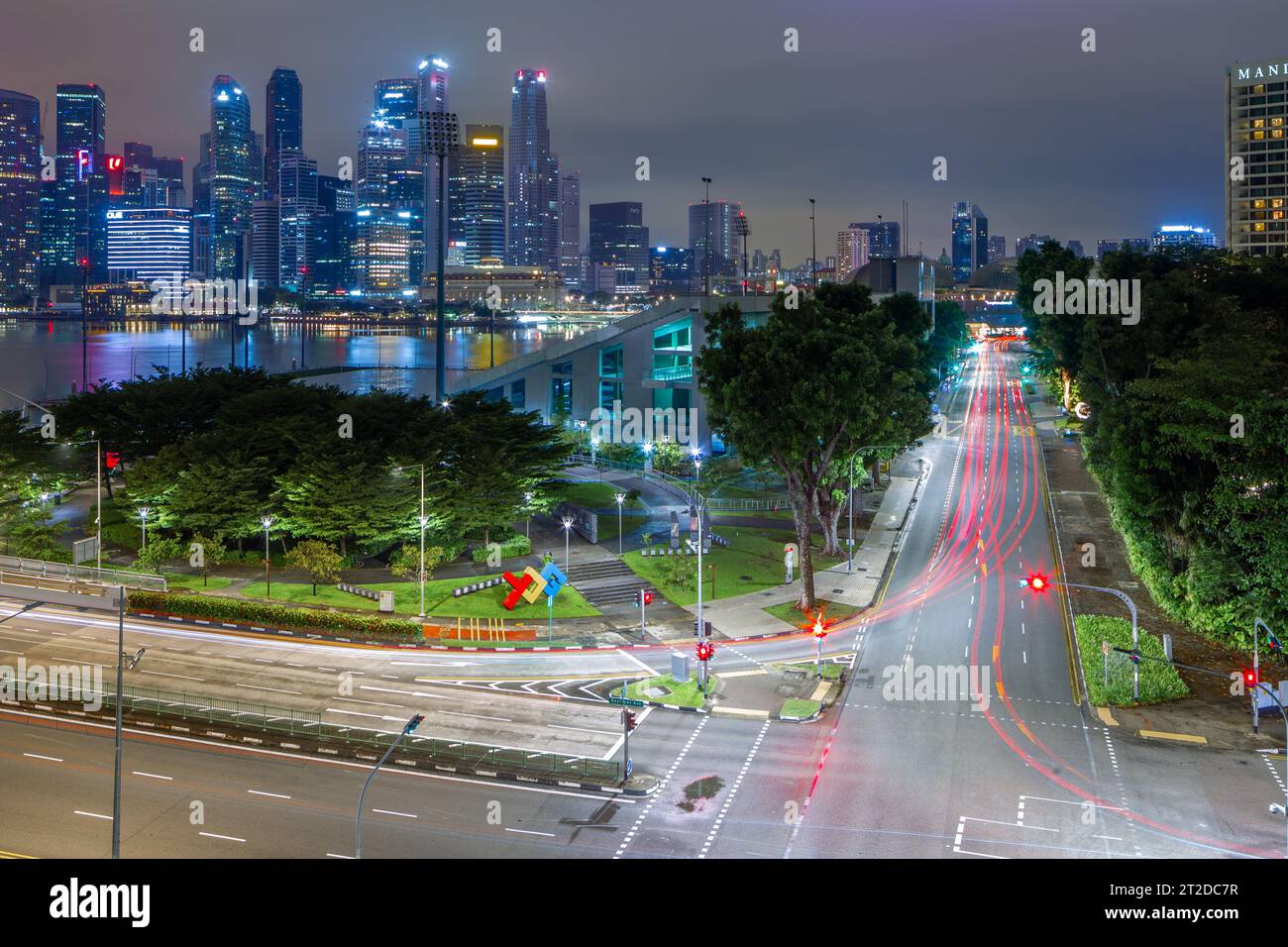 A night view of Singapore and Raffles Avenue at its intersection with ...