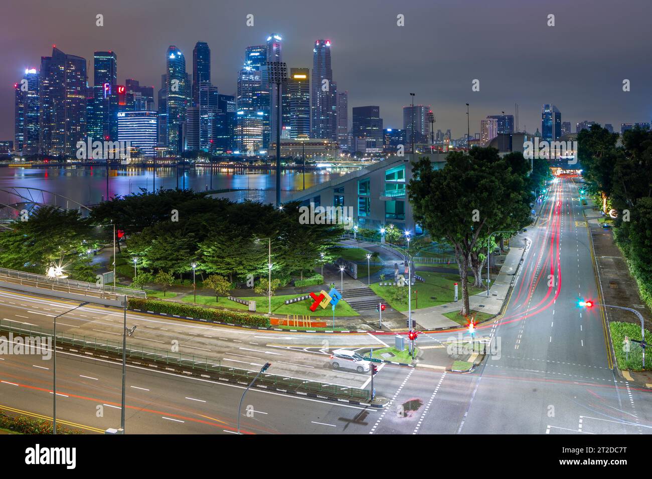 A night view of Singapore and Raffles Avenue at its intersection with ...