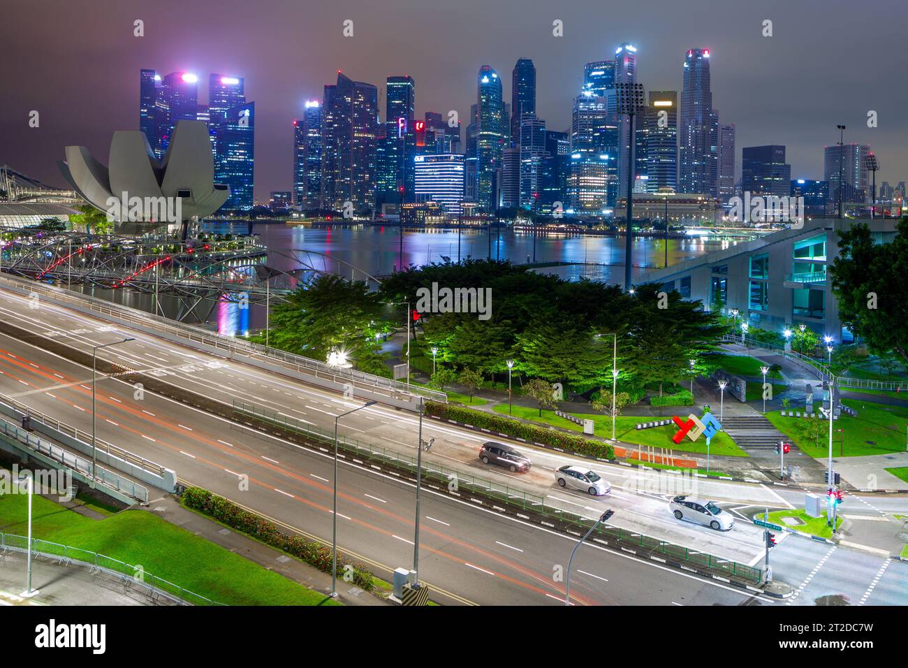 A night view of Singapore including the city skyline, the ArtScience ...