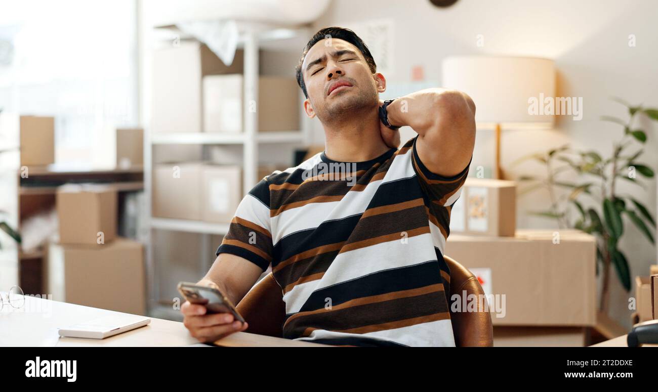 Man, neck pain and phone in office for business in e commerce ...