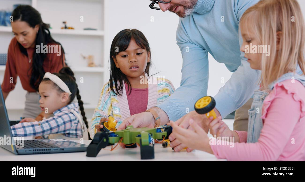 Technology, girls or robotics in classroom with teacher for learning ...