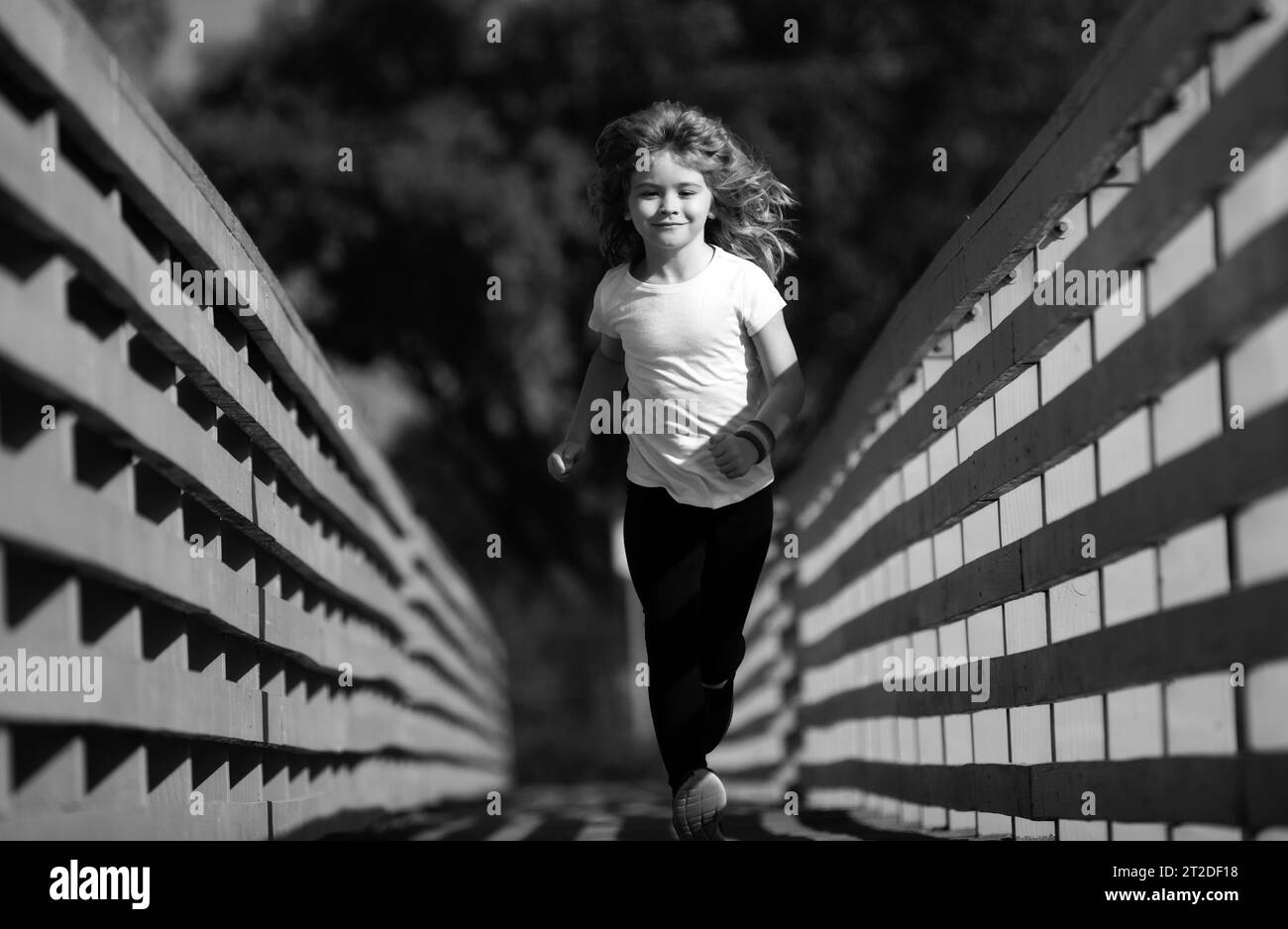 Child boy jogging in park outdoor. Sporty kid running in nature. Active ...