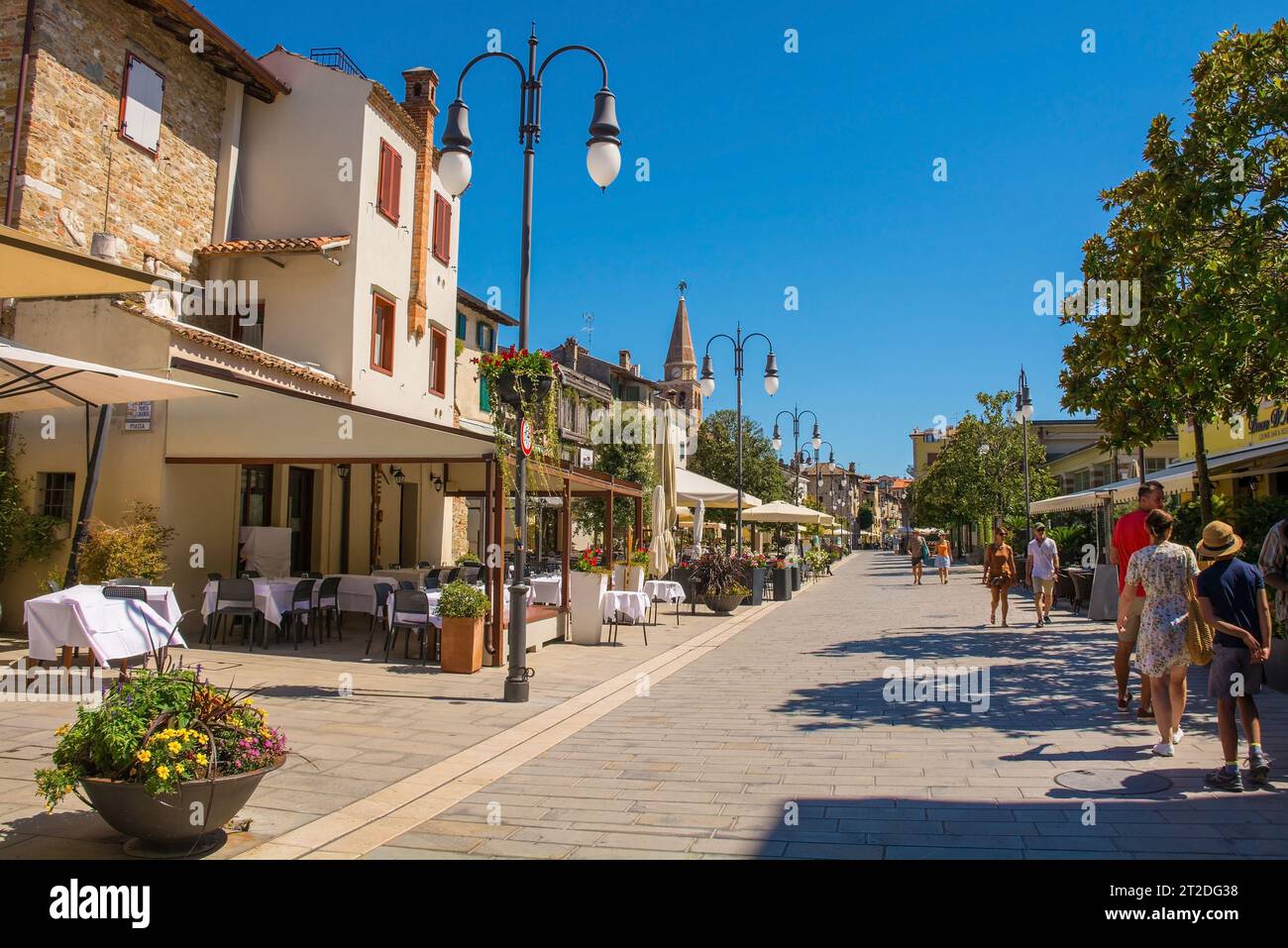 Grado, Italy - Aug 11th 2023. One of the main pedestrian roads, lined ...