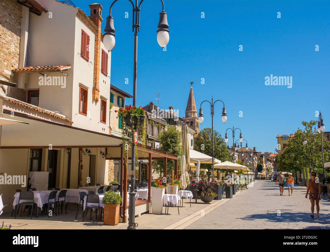Grado, Italy - Aug 11th 2023. One of the main pedestrian roads, lined ...