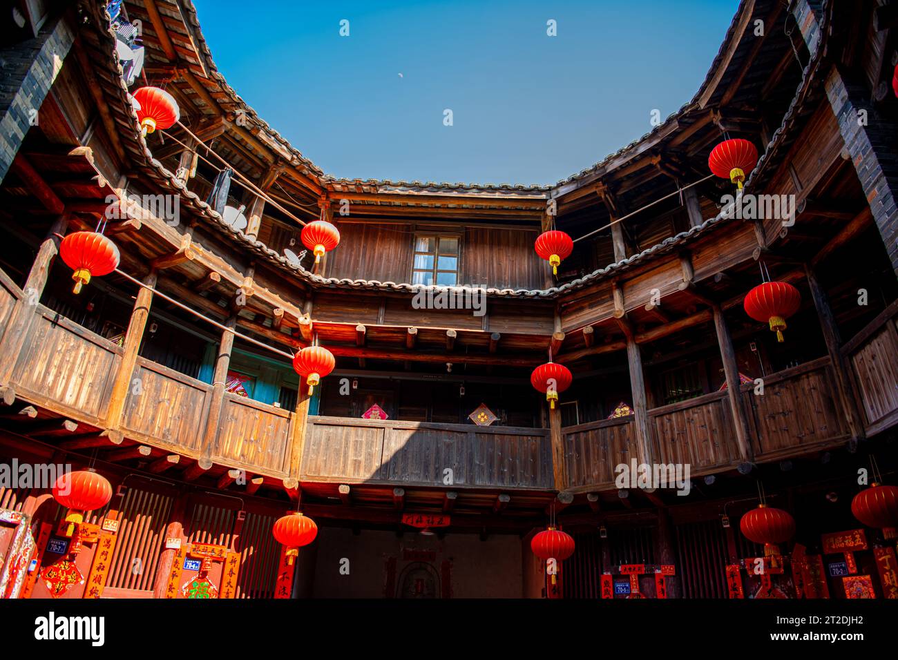 Inside Hekeng Tulou Cluster in the early morning. Tulou is the unique ...