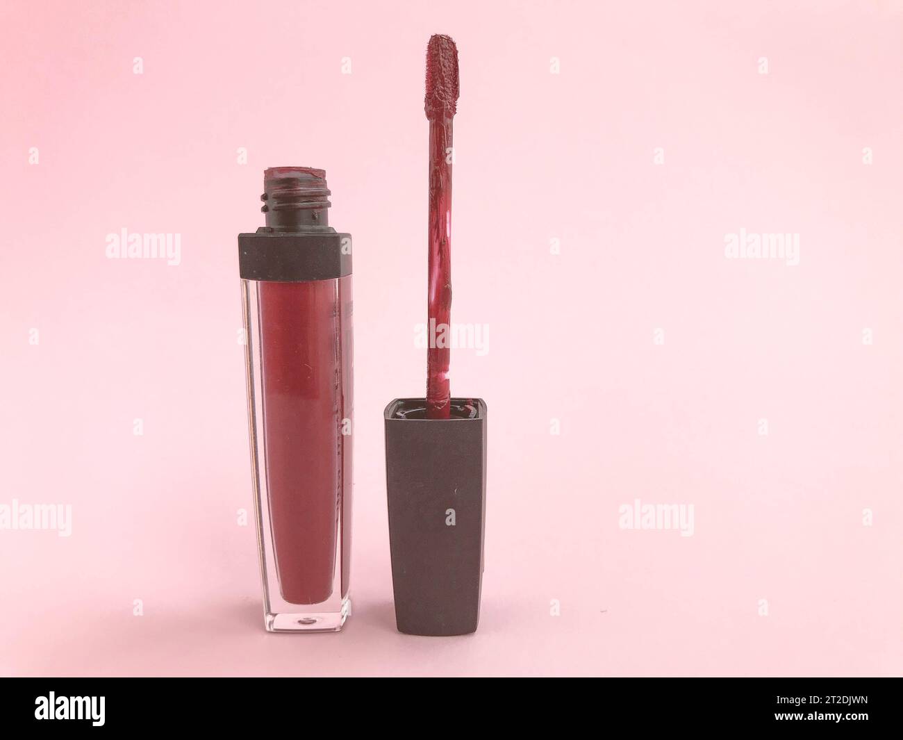 lipstick on a pink bright matte background. lipstick in a trendy ...