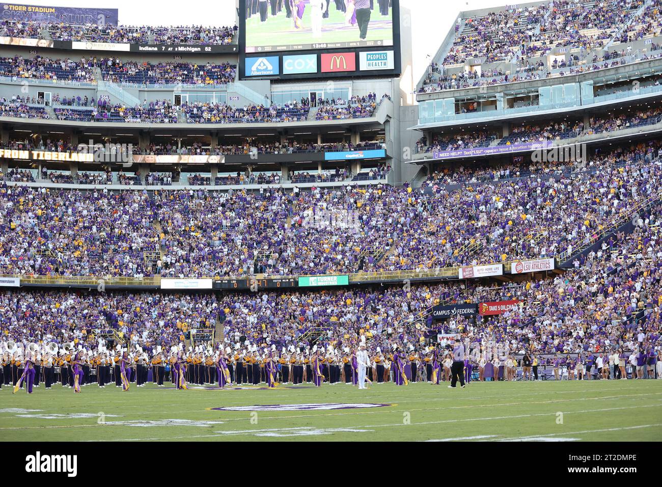 The LSU Tigers Marching Band walks onto the field prior to the start of ...