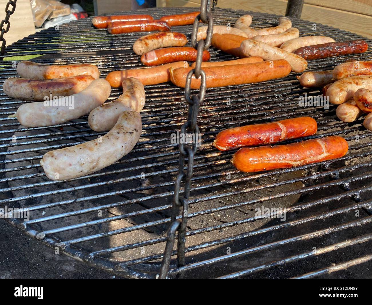 Grill czech sausages on on street food outdoor market. Fried baked ...