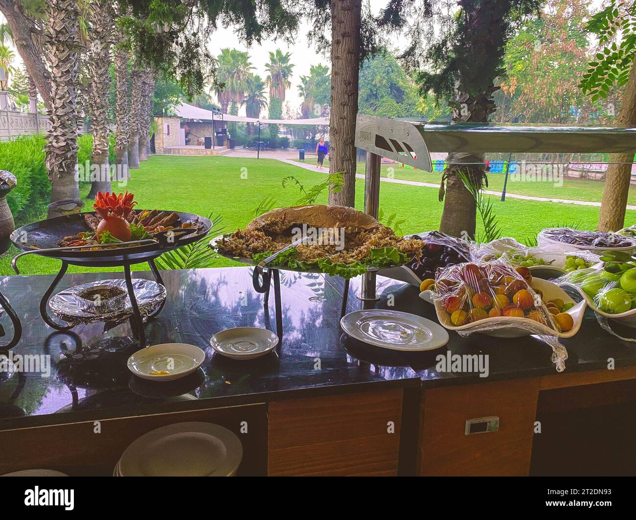 lunch at the hotel by the sea. dishes, cafes, fruits are displayed on ...