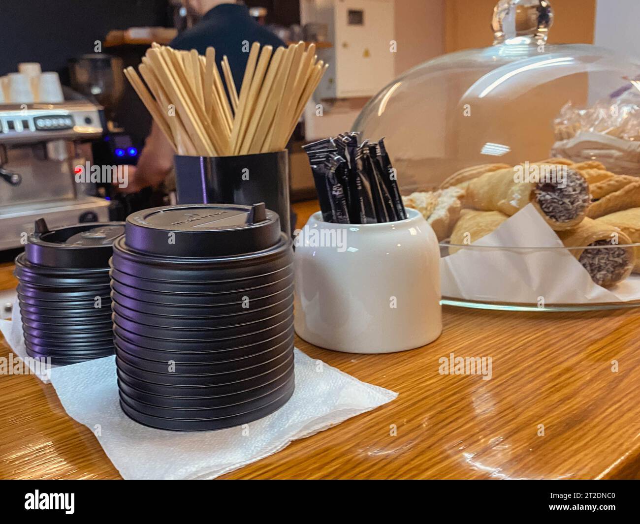 coffee table. cafe with a self-service counter. sugar, spices, wooden ...