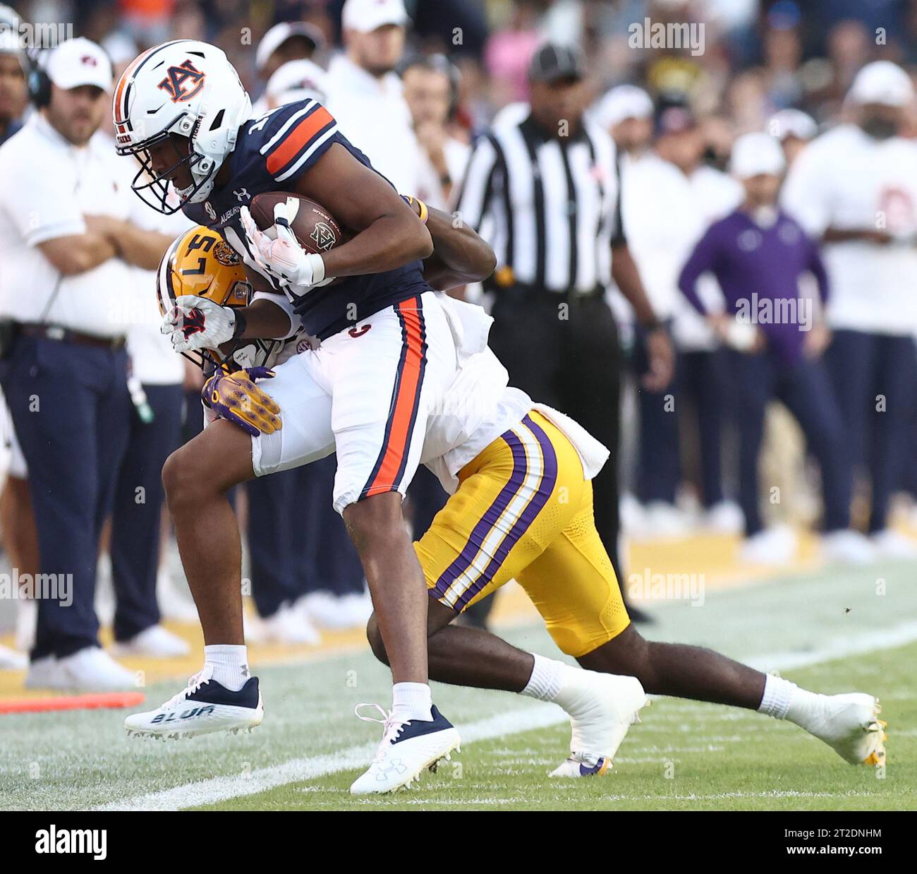 LSU Tigers cornerback Zy Alexander (24) tackles Auburn Tigers wide ...
