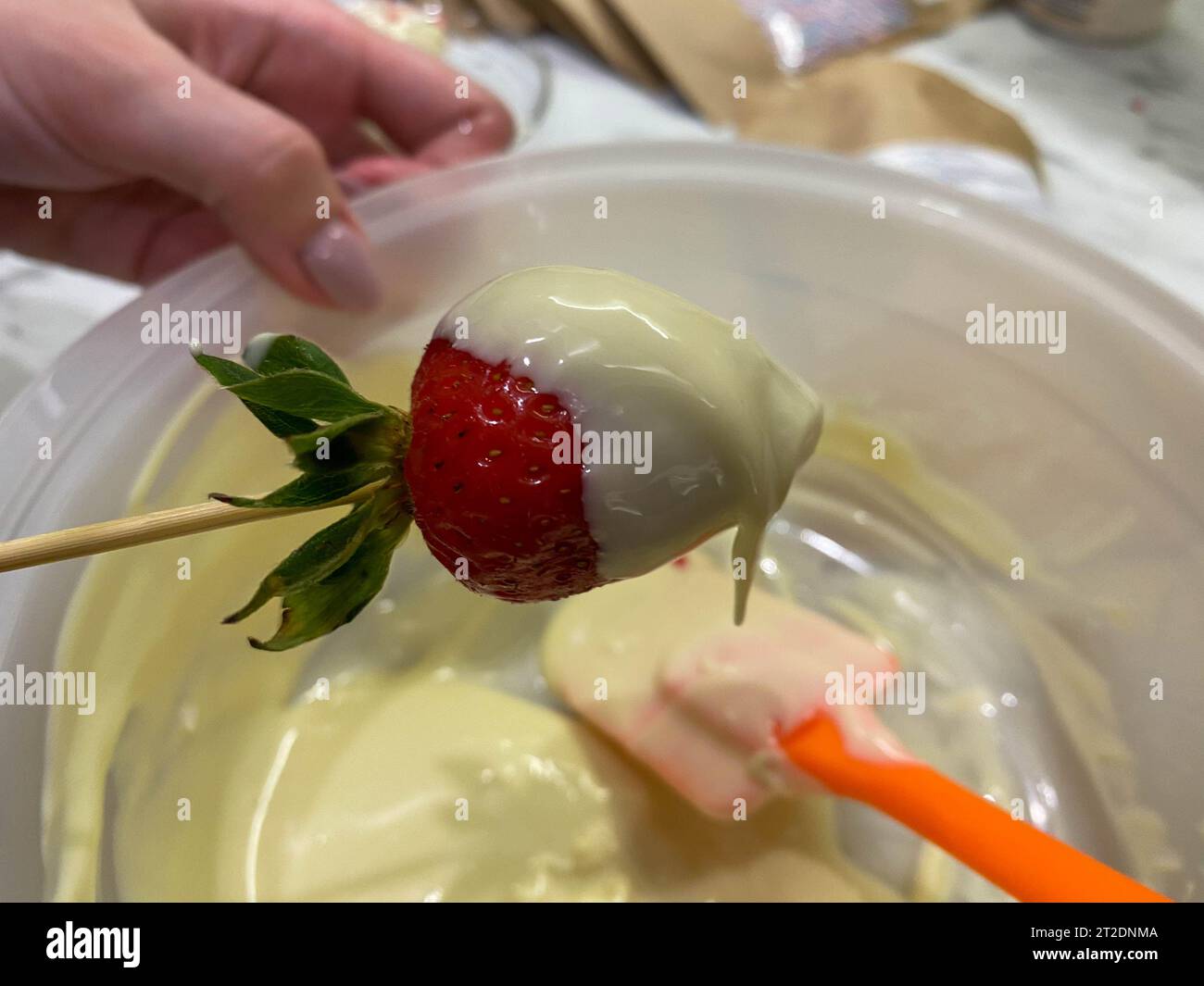 Red layered sweet strawberry tempered in white melted Belgian beautiful ...