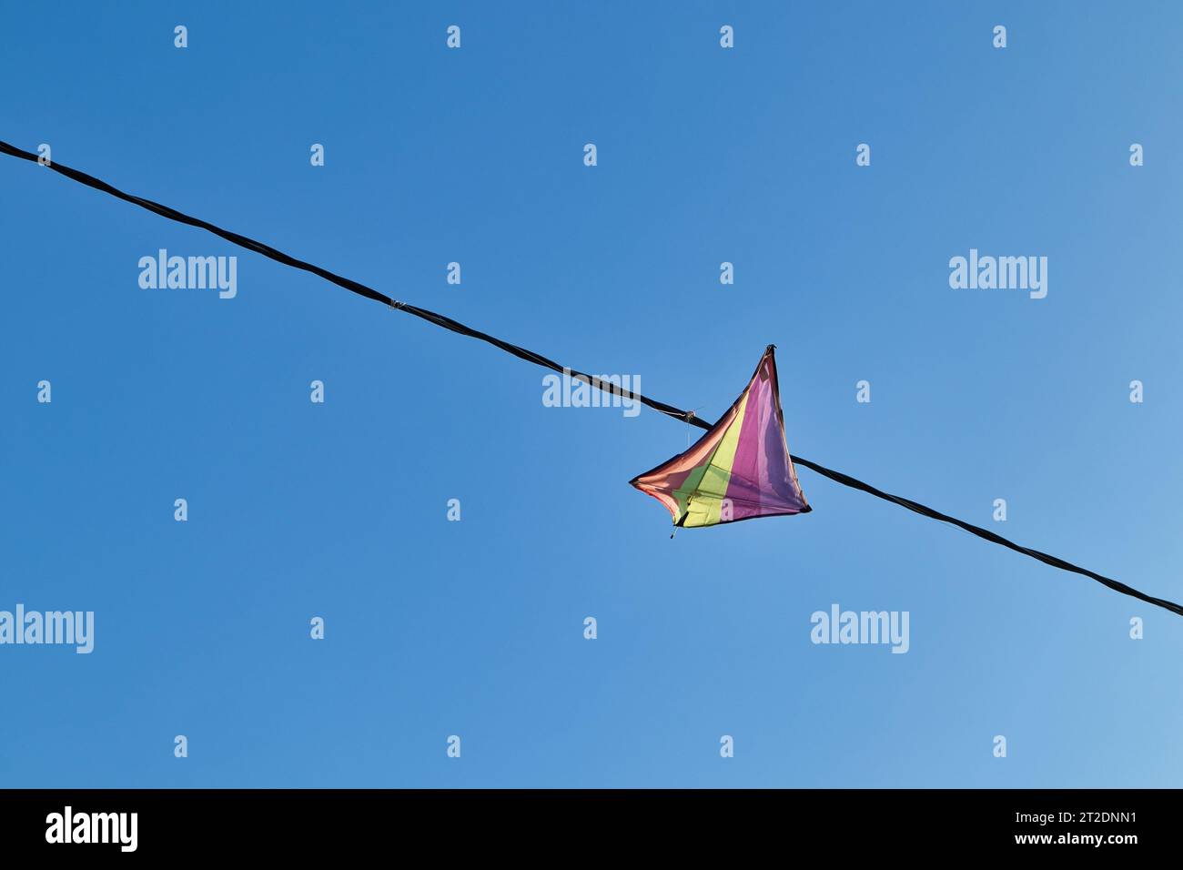 kite stuck in the electric power lines Stock Photo - Alamy