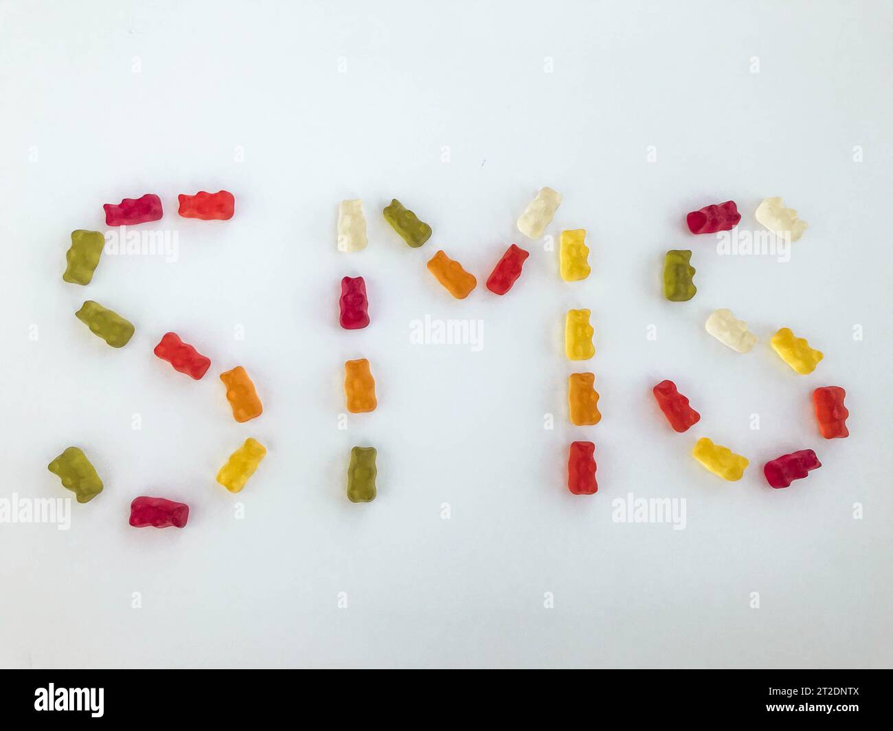 letter from multi-colored gummy bears. Letter S and M made from ...