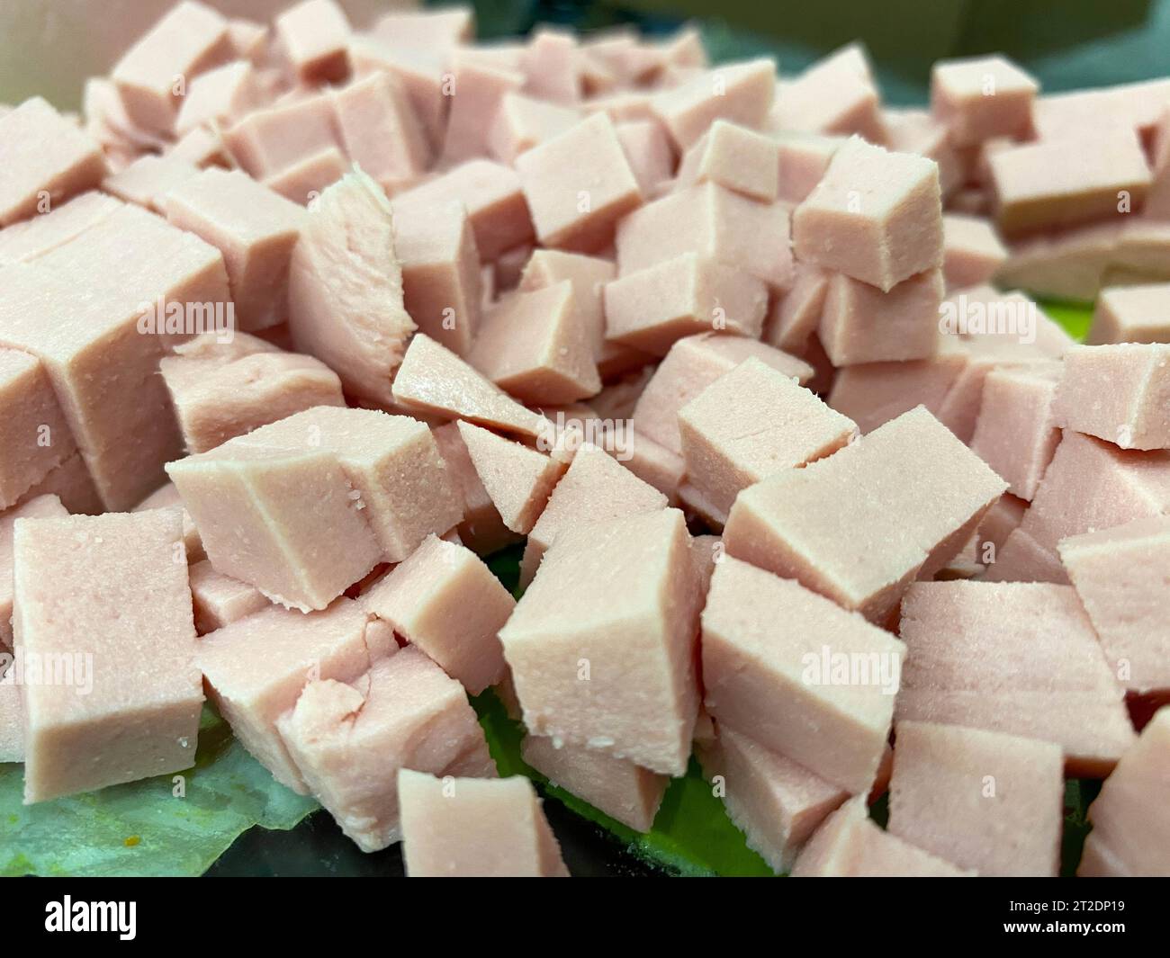 Delicious boiled meat sausage finely diced for Russian salad Olivier ...