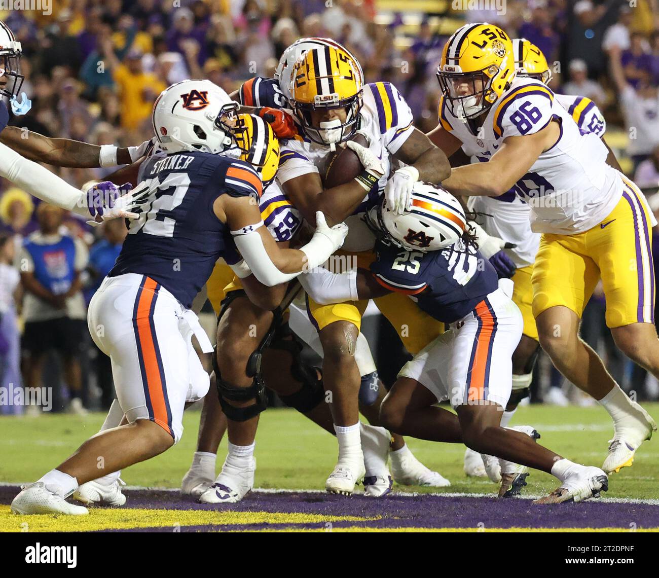 LSU Tigers running back Logan Diggs (3) goes through Auburn Tigers ...