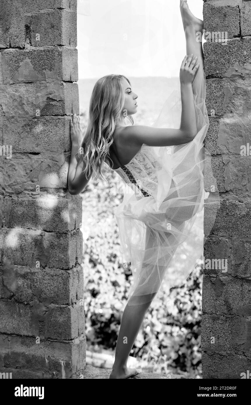 Yoga woman stretching with pose stretch. Leg-split, flexible girl doing ...