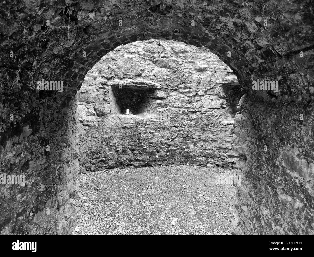 Stone arch of old celtic fortress, a Blarney castle in Ireland, rocks ...