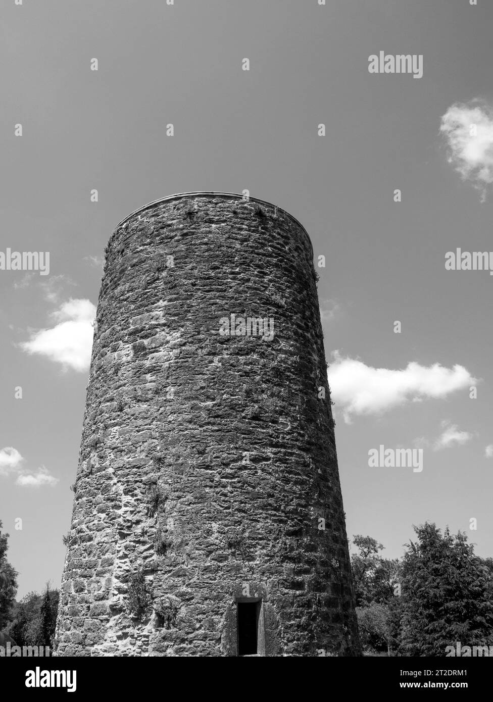 Old celtic castle tower over blue sky background, Blarney castle in ...