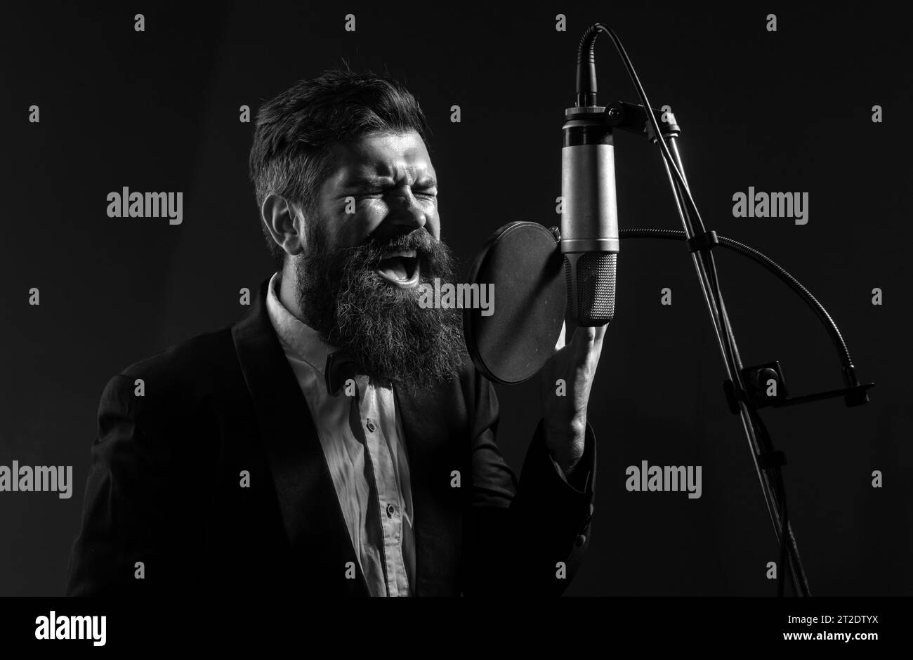 Man singing in recording studio Black and White Stock Photos & Images ...