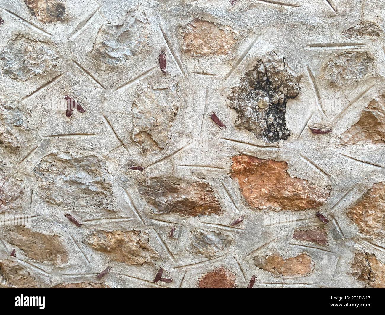 Background, texture, stone wall of round stones cobblestones bricks ...