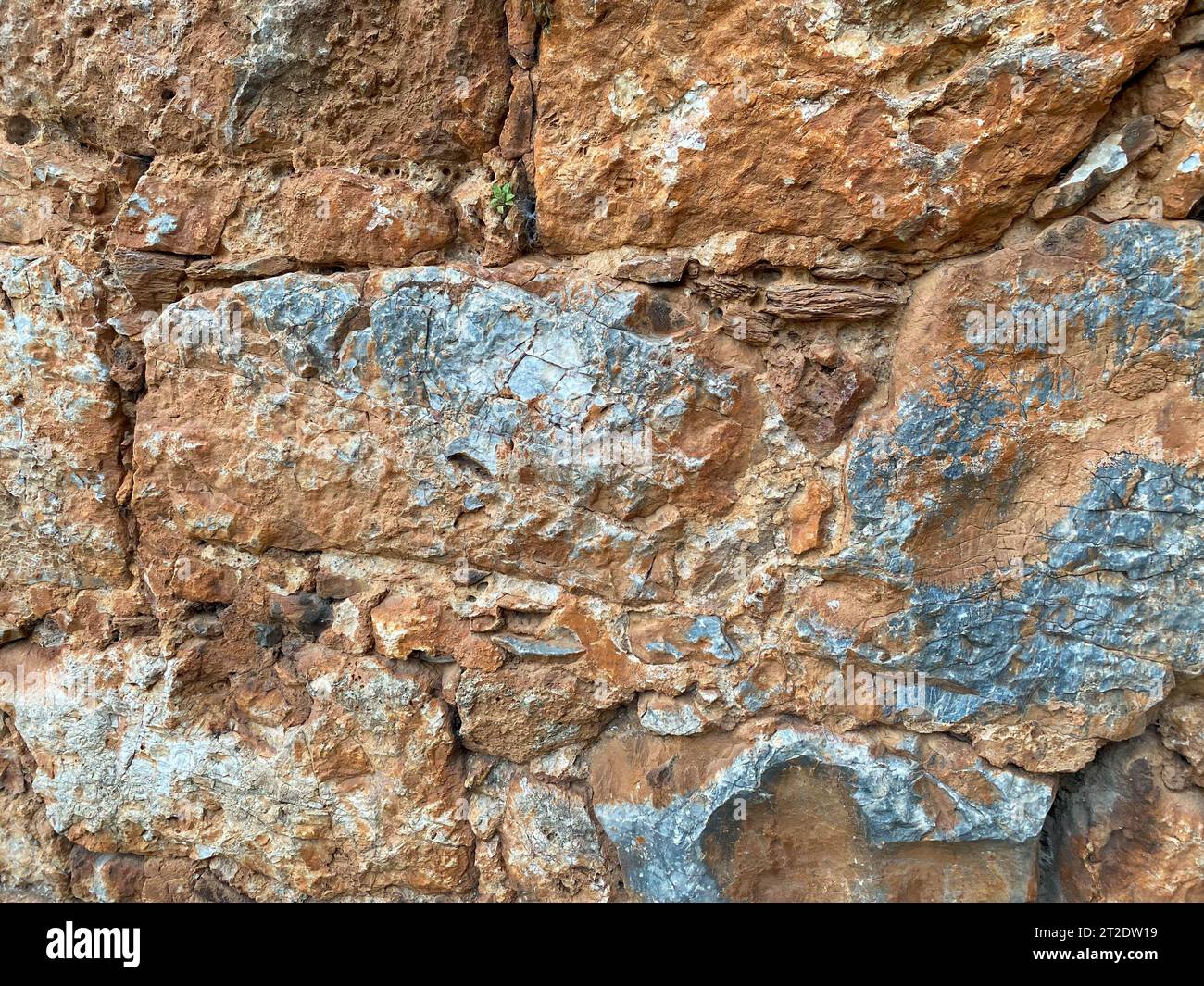 Background, texture, stone wall of round stones cobblestones bricks ...