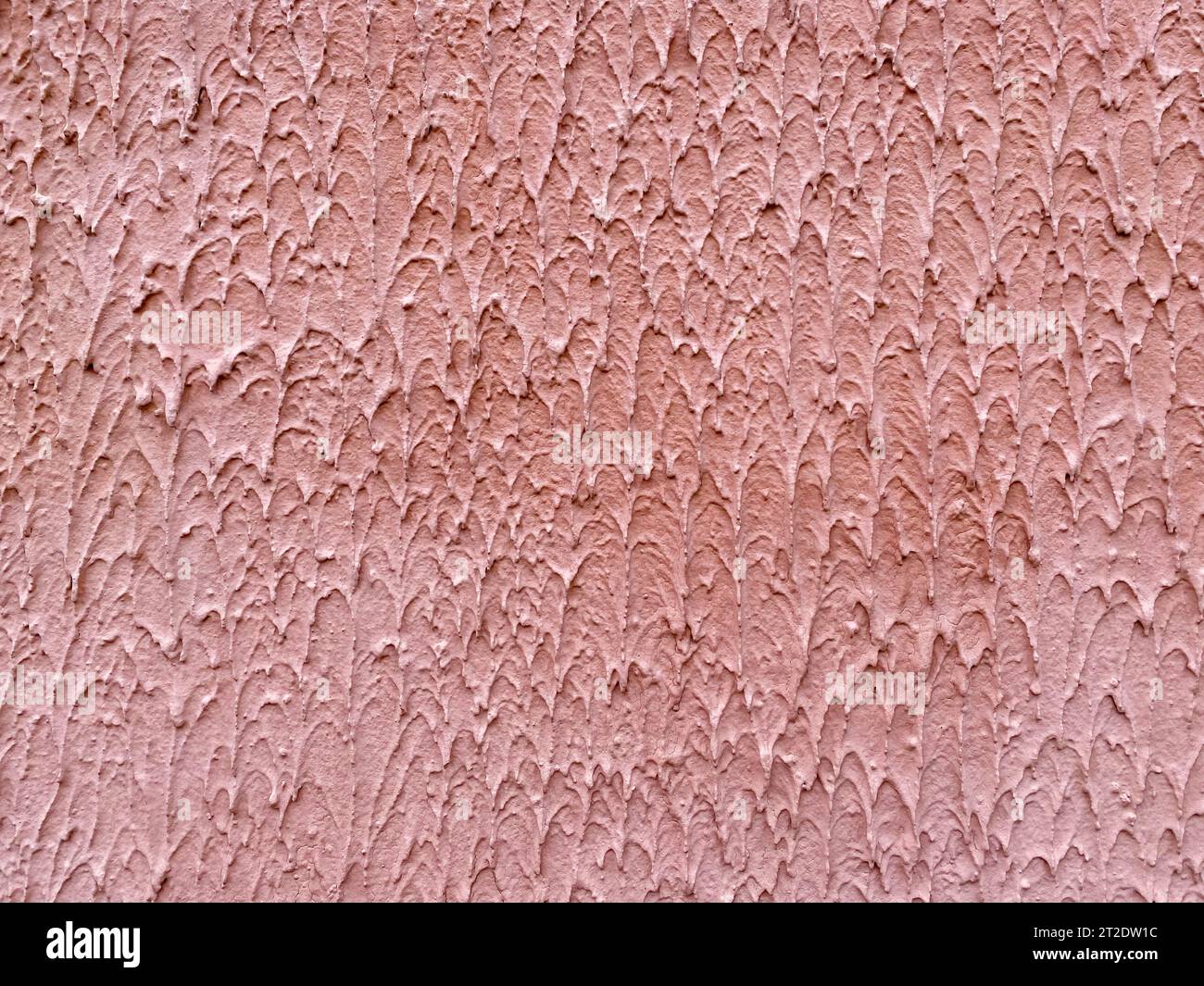 Red texture of decorative plaster bark beetle with thorns and a rough ...