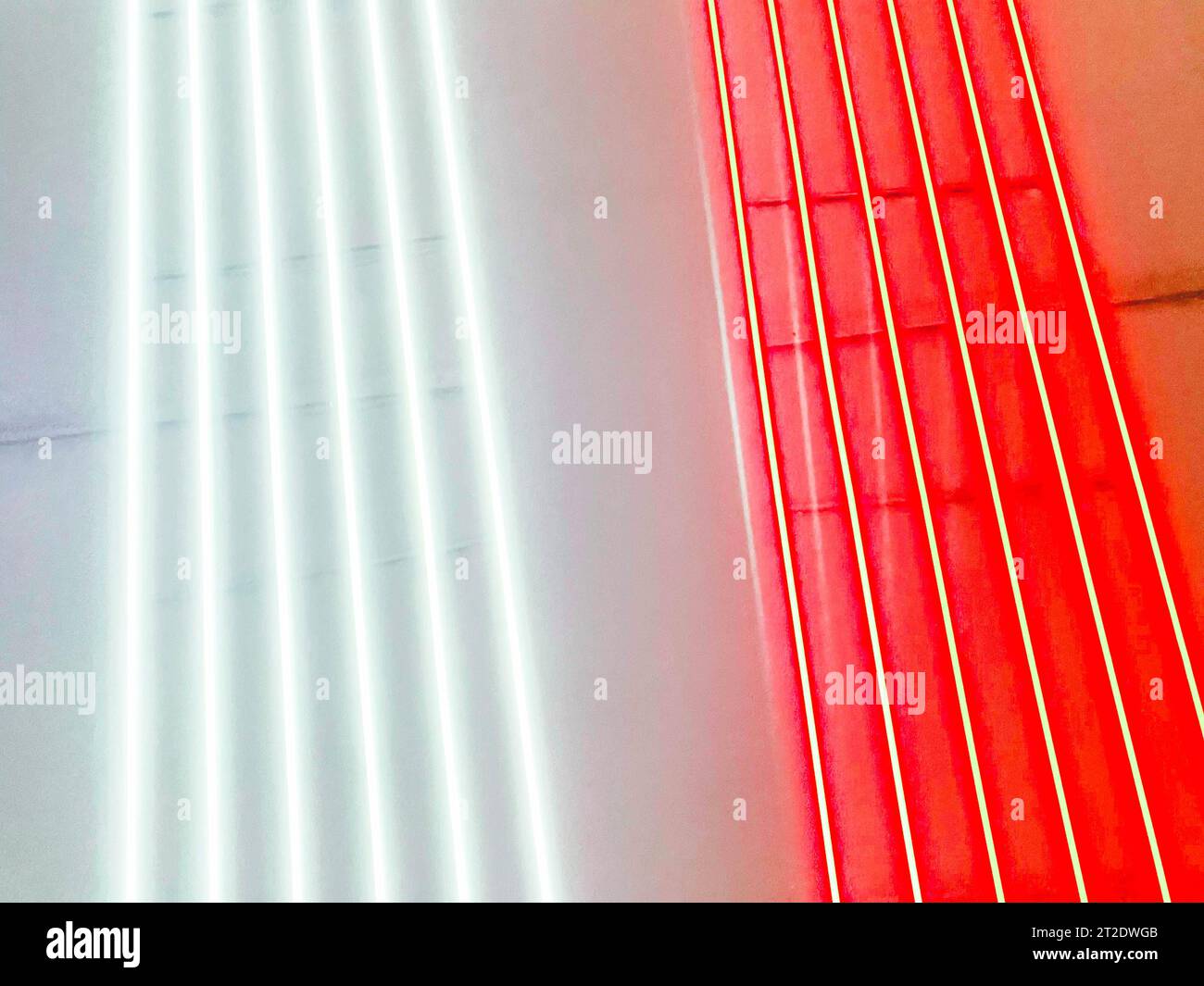 neon stripes, illumination at the metro station. stripes of red and ...