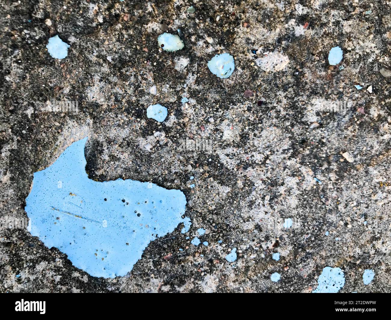The texture of the old gray concrete cemented plaster wall with cracks ...
