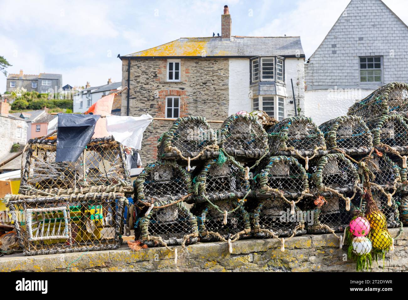 Lobster and crab fishing pots, Port Isaac harbour wall,Cornwall,England ...
