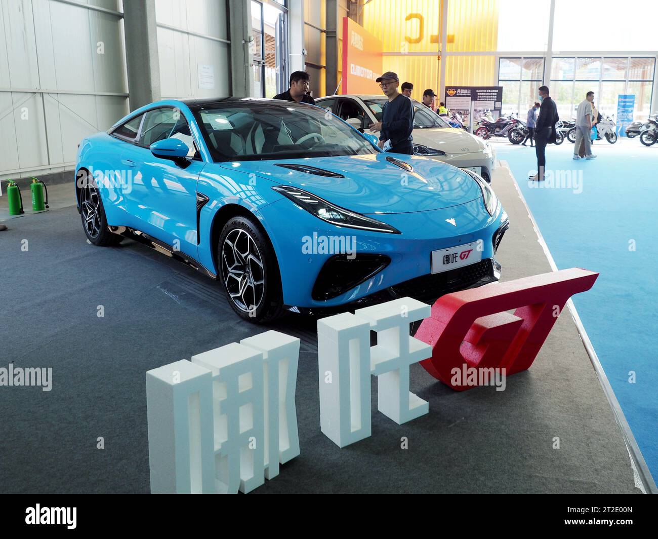BEIJING, CHINA - OCTOBER 19, 2023 - Visitors look at cars on display at ...