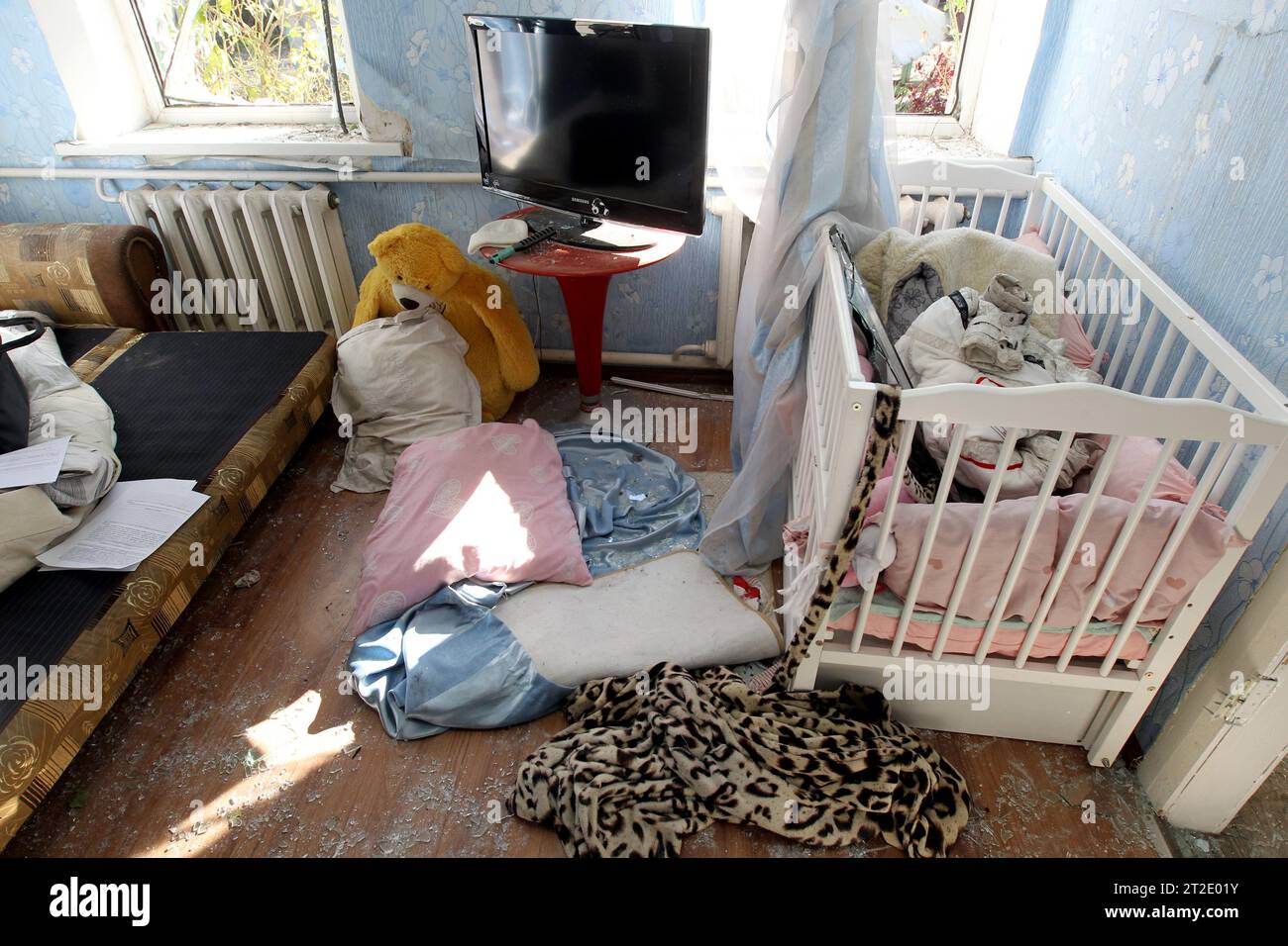 DNIPRO, UKRAINE - OCTOBER 18, 2023 - A bedroom shows damage inside a ...
