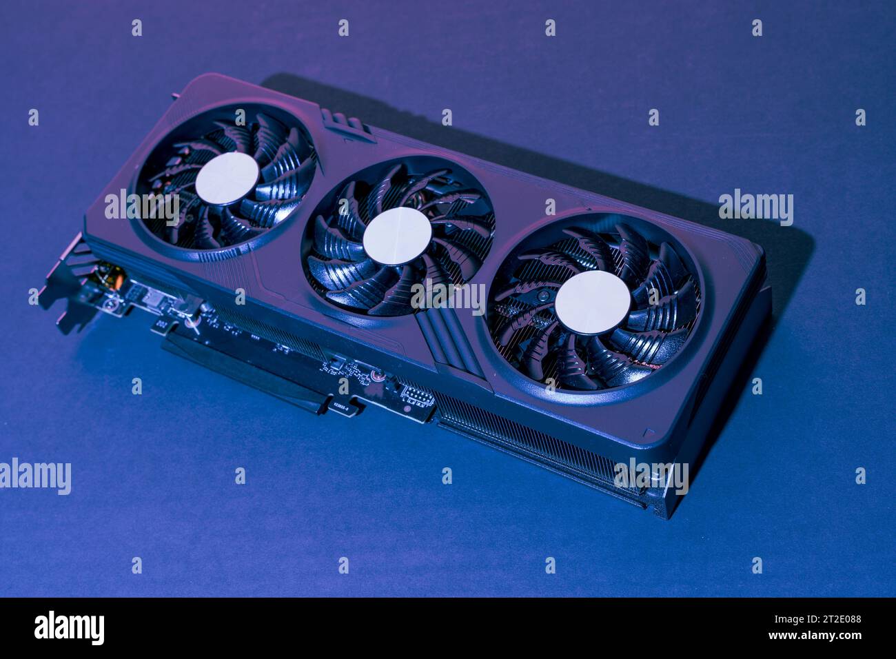 a modern powerful gaming graphics card for a computer with three fans ...