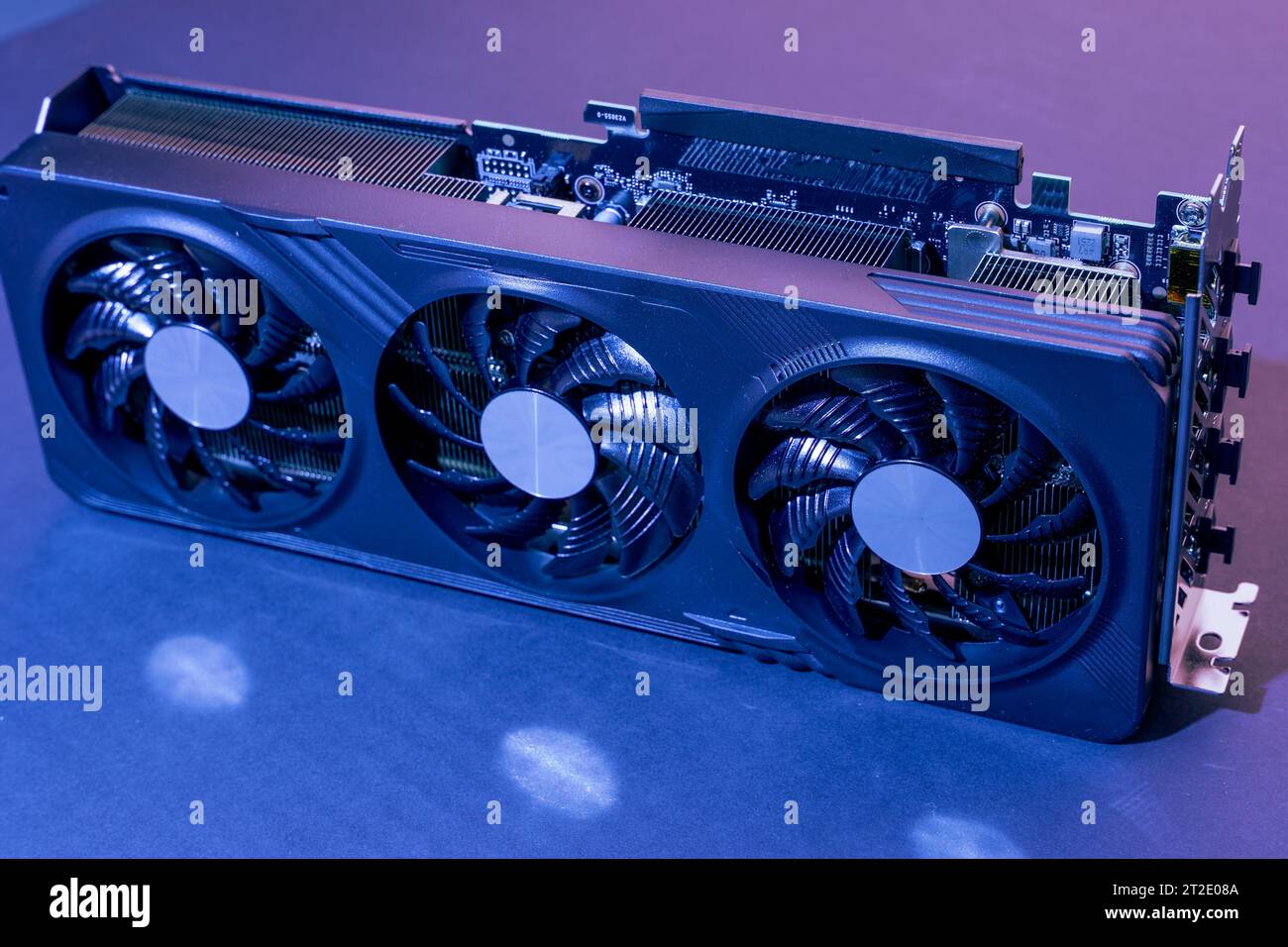 a modern powerful gaming graphics card for a computer with three fans ...