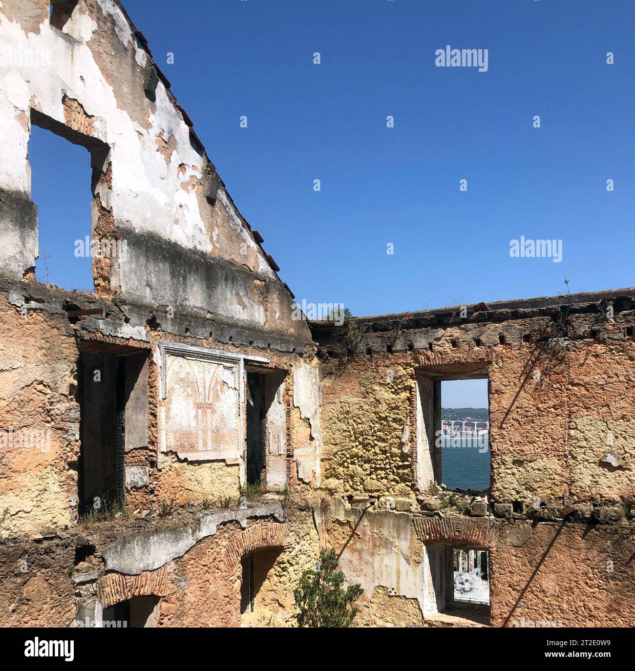 Inside the ruin of a burned out building after the fire took the roof ...
