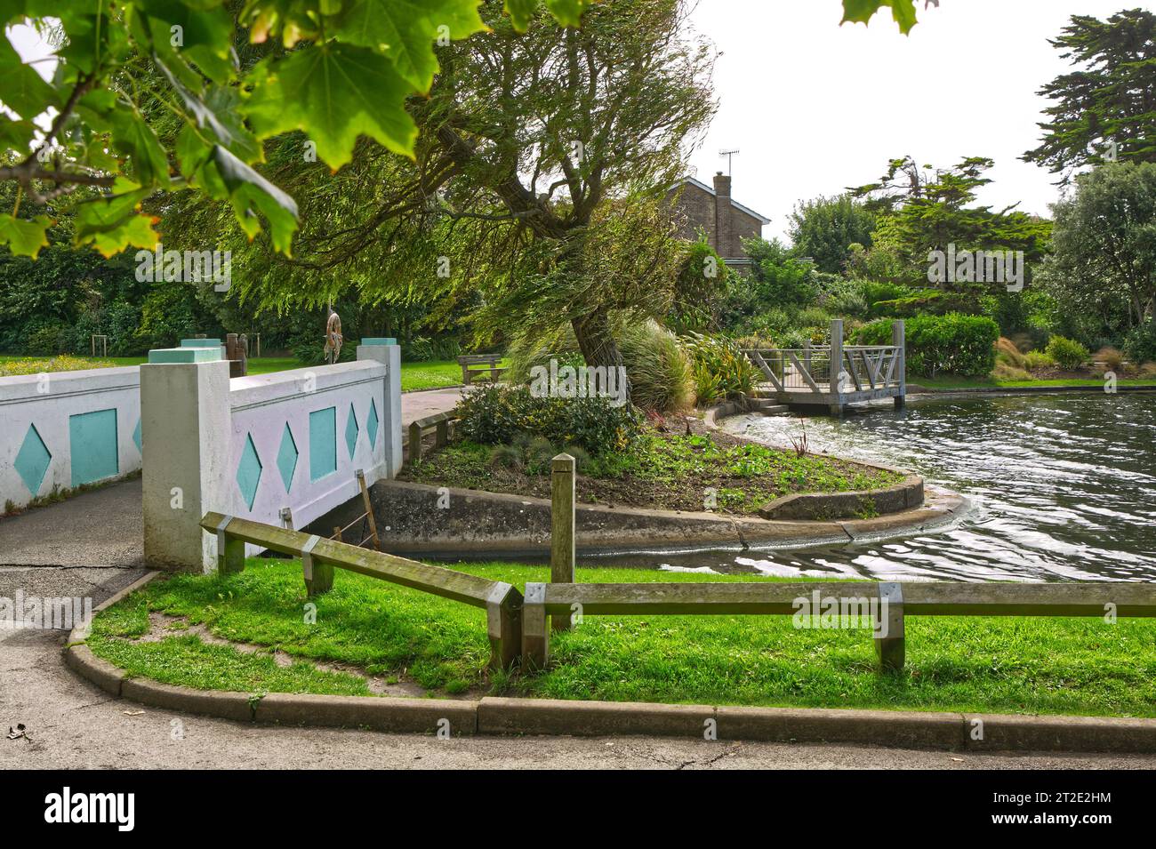 Pond, path and bridge in Meadowsbrook Park, Littlehampton, West Sussex ...