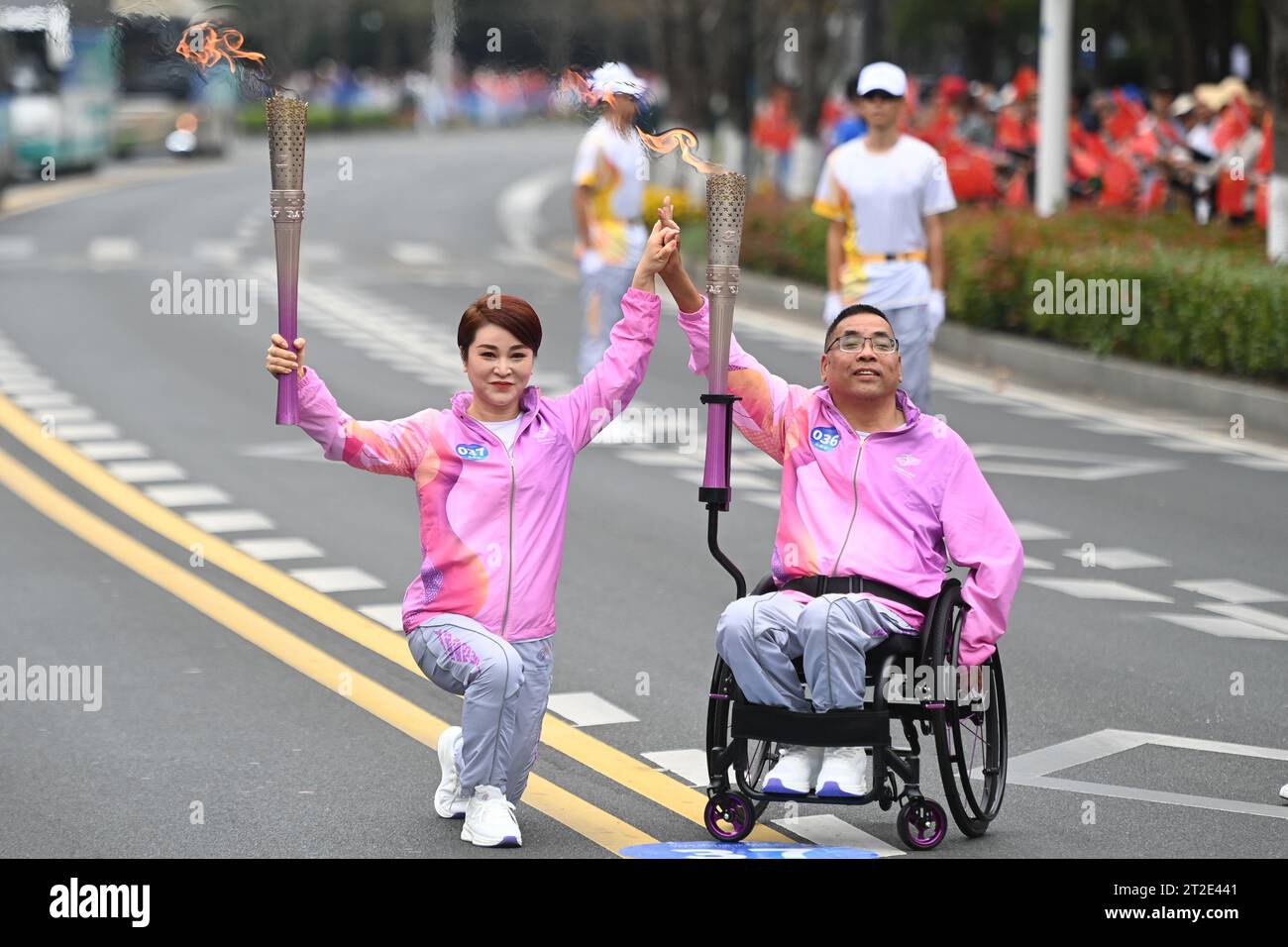 Hangzhou, China's Zhejiang Province. 19th Oct, 2023. Torch bearers Wang ...