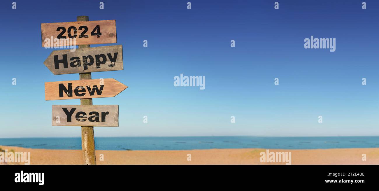 2024 written on a beach in sand hi-res stock photography and images - Alamy