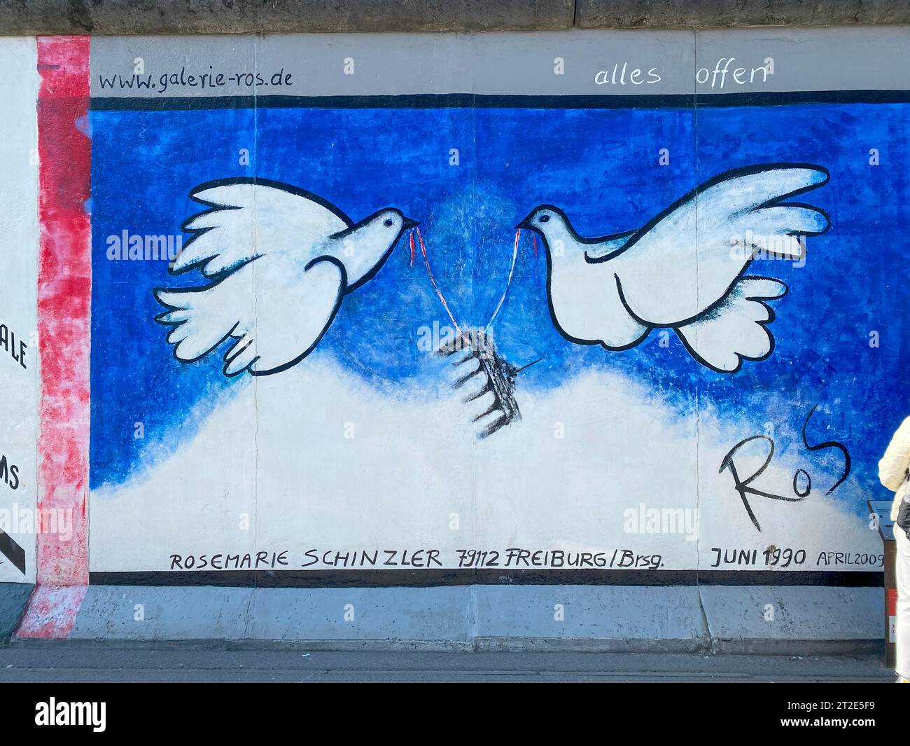 Doves of peace with the Brandenburg Gate painted on remains of the ...