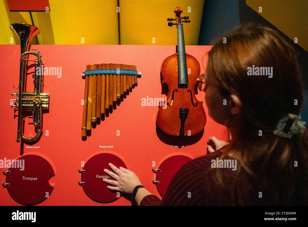 London, UK. 19 October 2023. A staff member interacts with musical ...