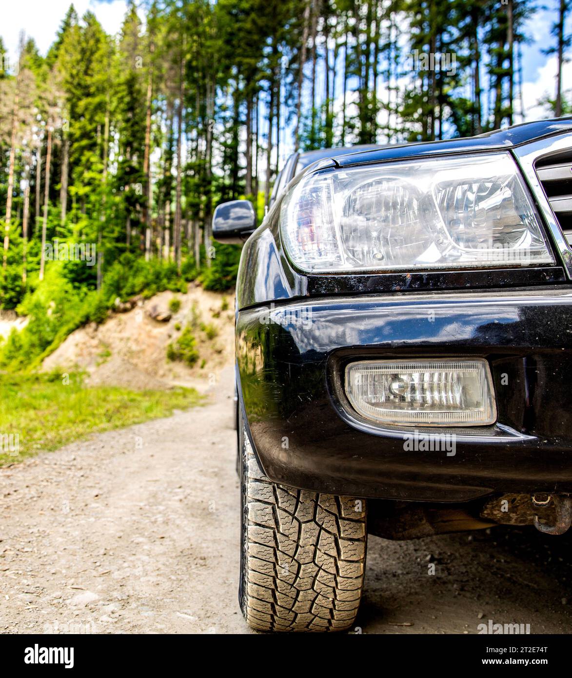 Offroad wheel. Closeup of car wheel on steppe terrain. Off-road on ...