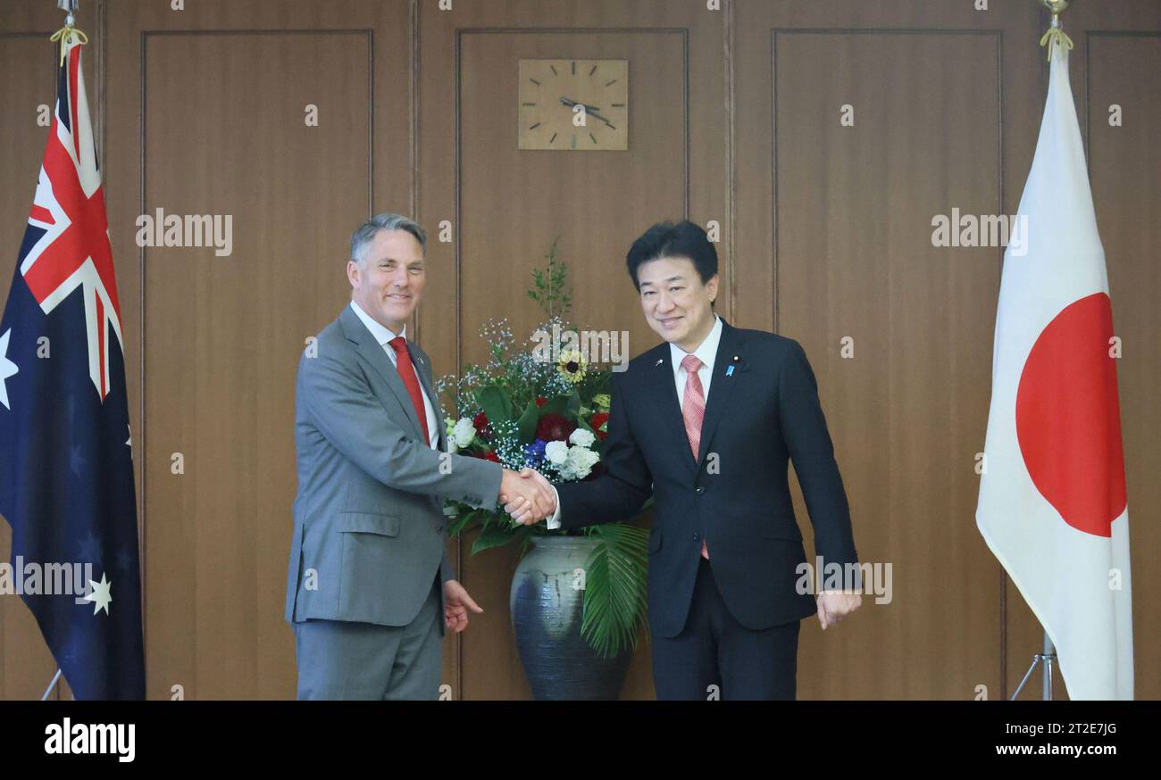 Japanese Defense Minister Minoru Kihara (R) and his Australian ...