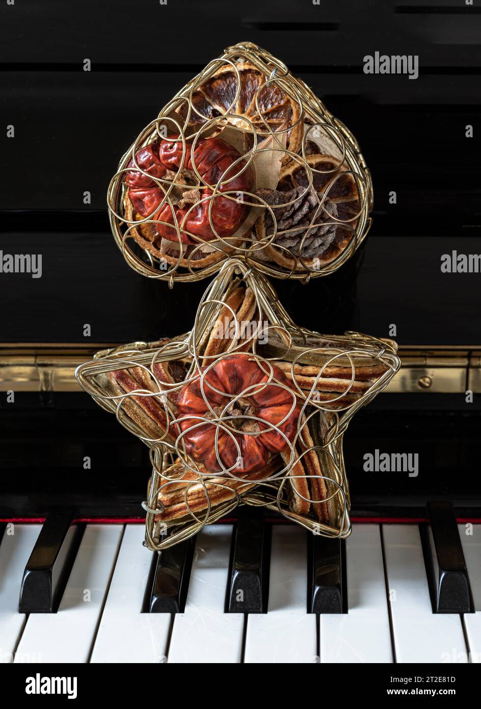 Golden heart shaped mesh case and Golden star shaped mesh case are ...