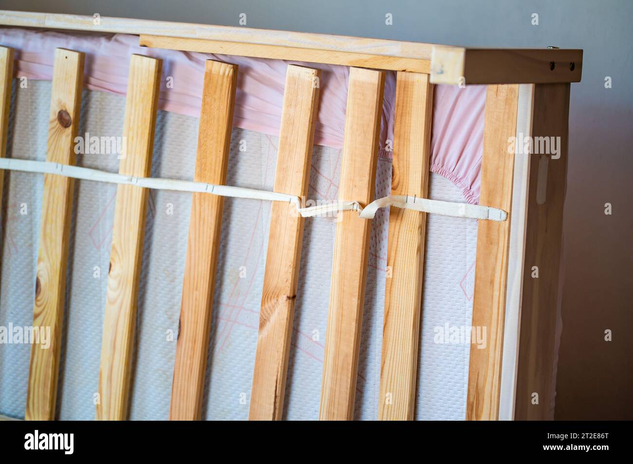 View of bottom part of wooden bed and the frame Stock Photo - Alamy