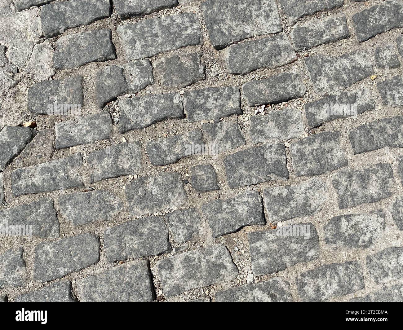 Covering of old rectangular stone paving, paving slabs Stock Photo - Alamy