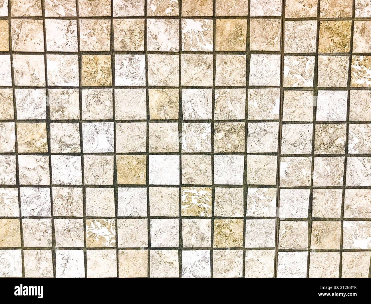 The texture of the small square ceramic brown decorative tiles, mosaics ...