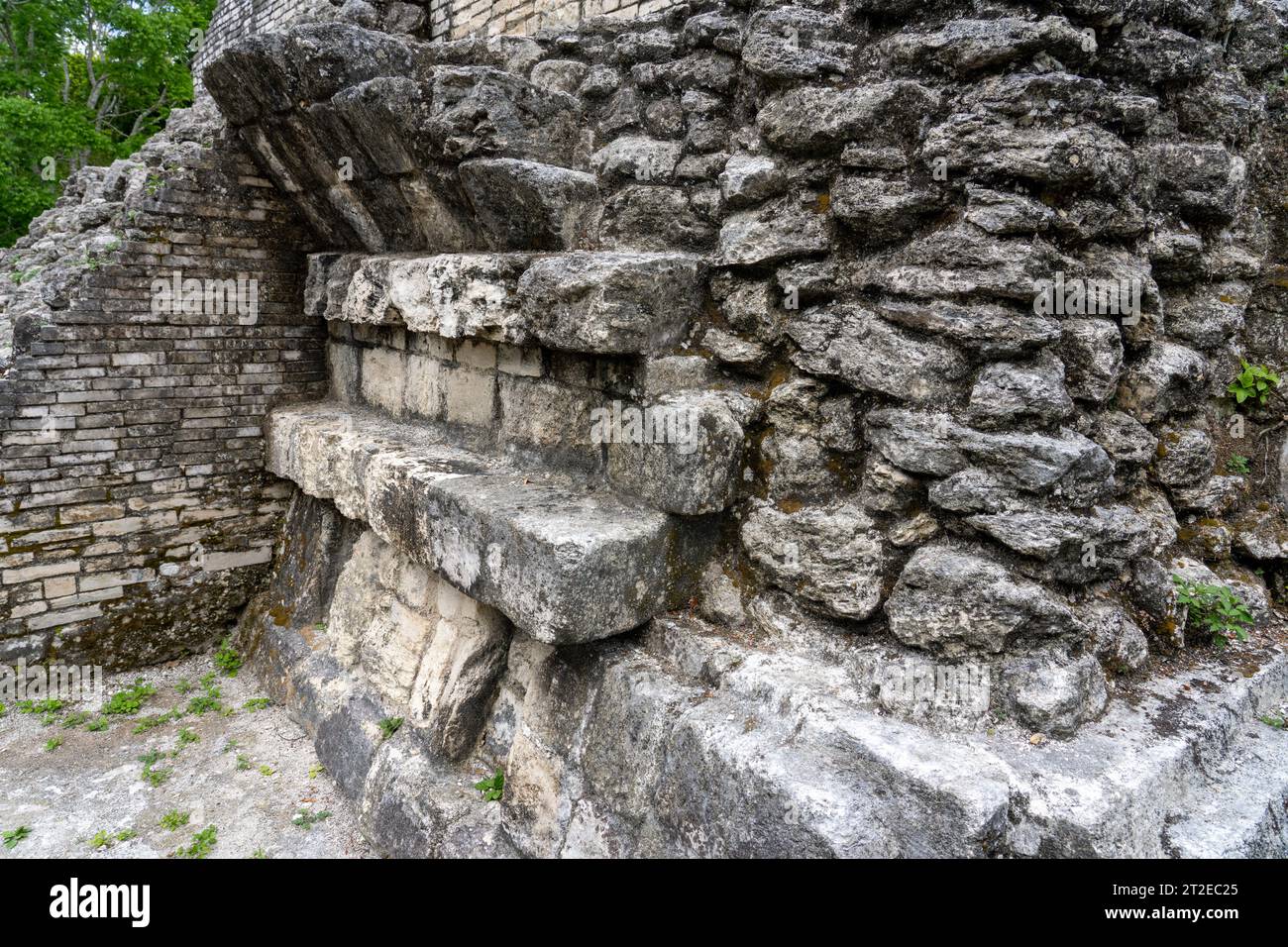 Detail of talud-tablero architectural style in the Mayan ruins of Yaxha ...